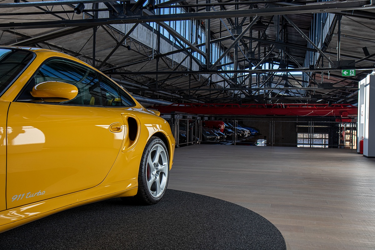 A Stylish Space for Classic Car Lovers with Engineered Oak Floors in ...