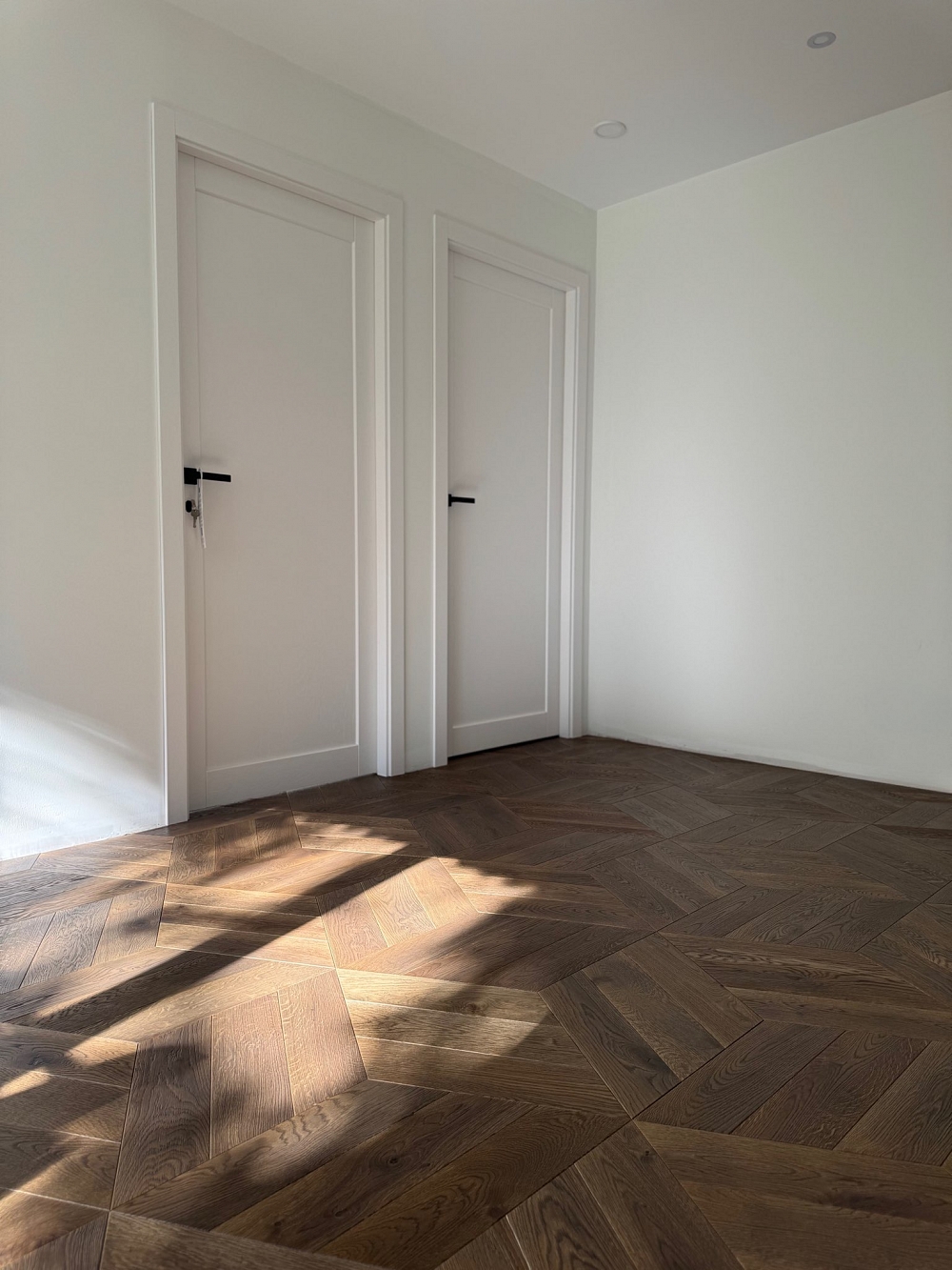 Diamond oak parquet in Tobacco colour and panel solid oak doors in RAL ...